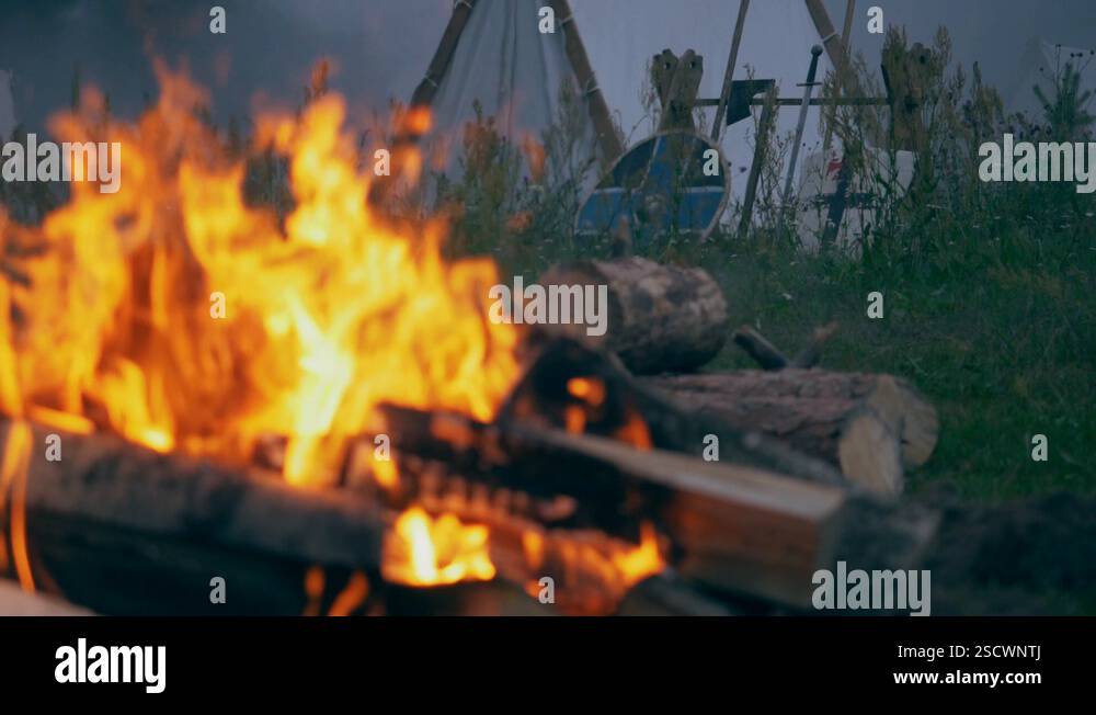 Fire on the battlefield and armor shields and medieval weapons Stock ...