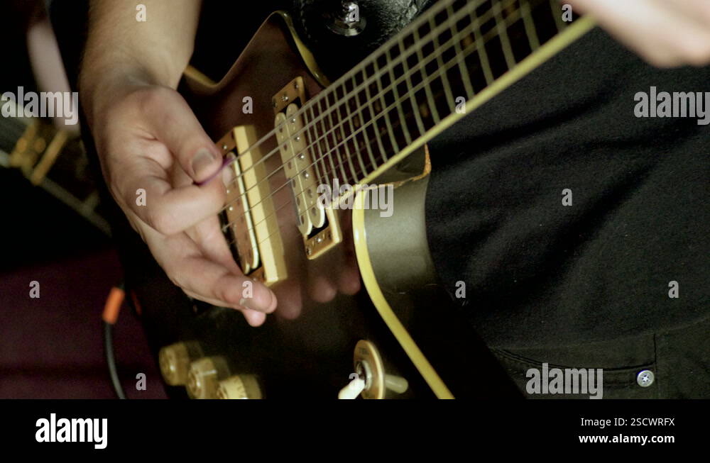 Musical metal band. Group of musicians playing rock music on stage. 4K ...