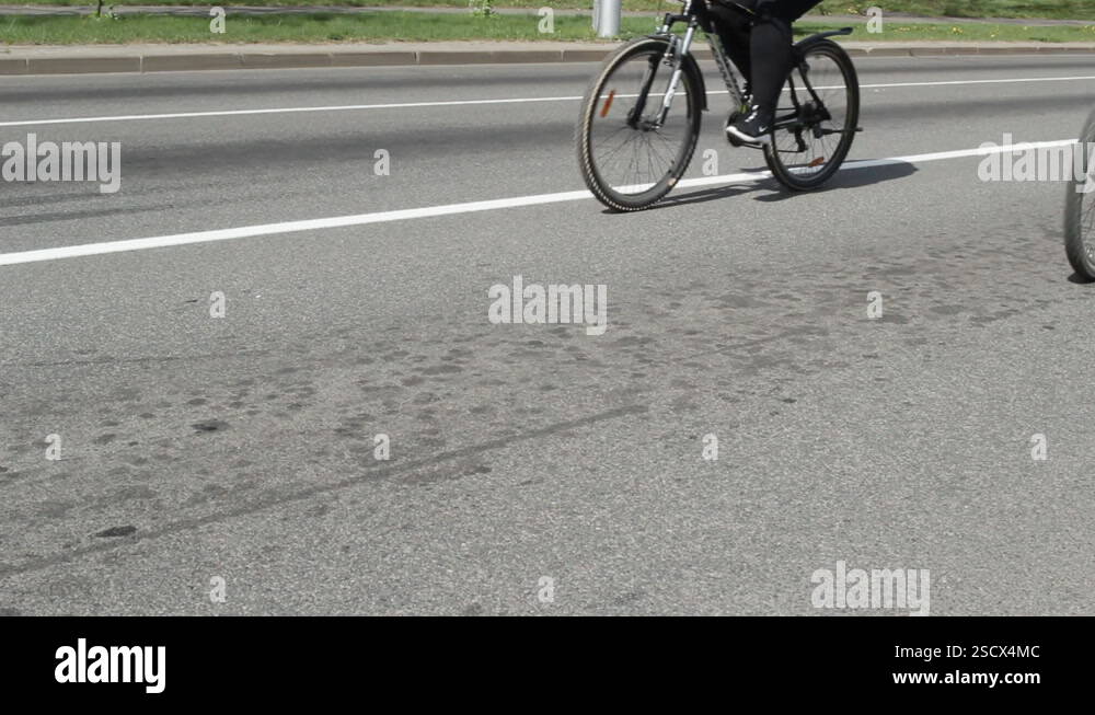 Many people ride bicycles in the city for a bike ride, background ...