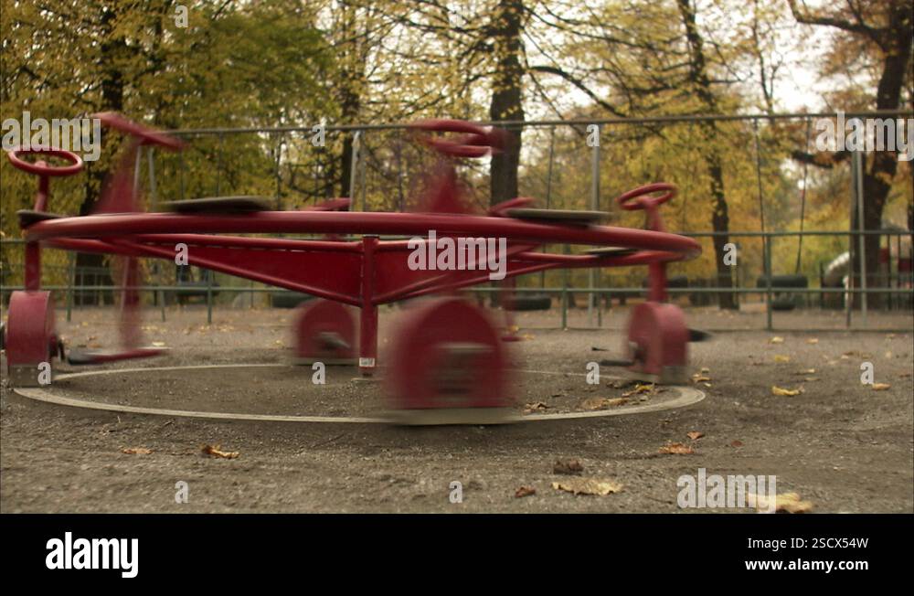 A roundabout in a playground Stock Video Footage - Alamy