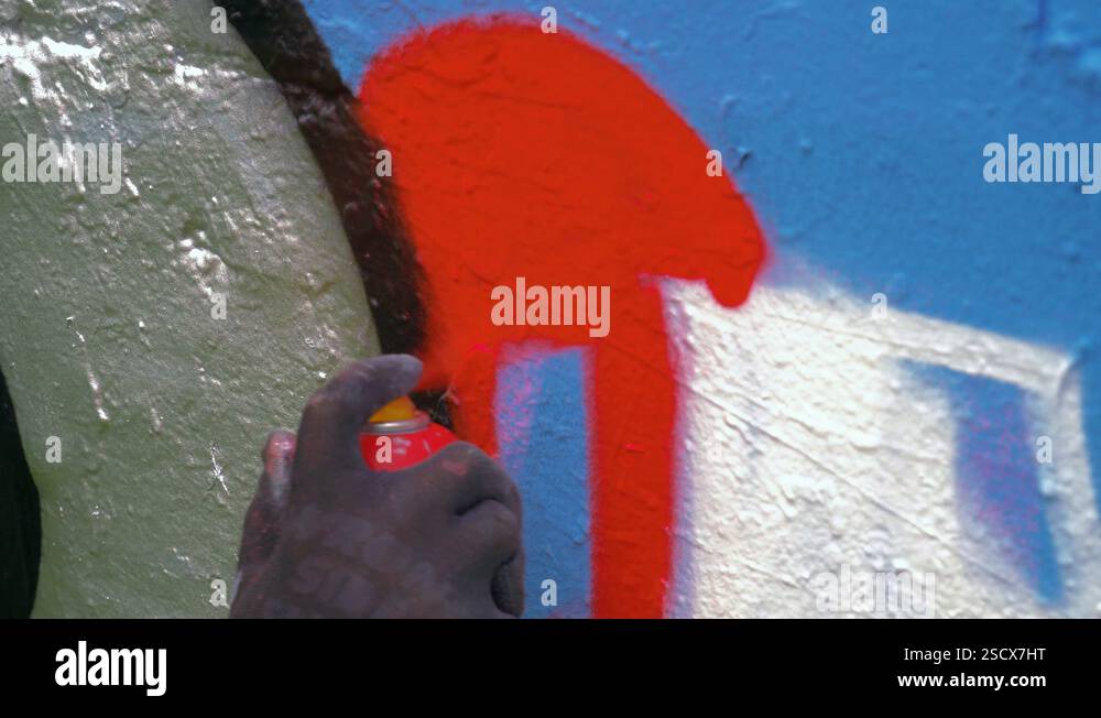 Spray paint, Graffiti, hand spray painting graffiti Stock Video Footage ...