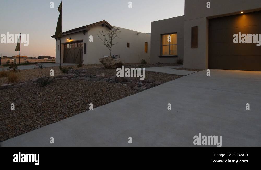 Two Southwest Homes Rising View at Sunset Stock Video Footage - Alamy