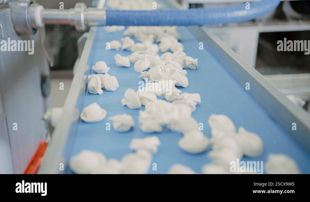 Close Up Footage of the Automatic Machine Production Process at ...