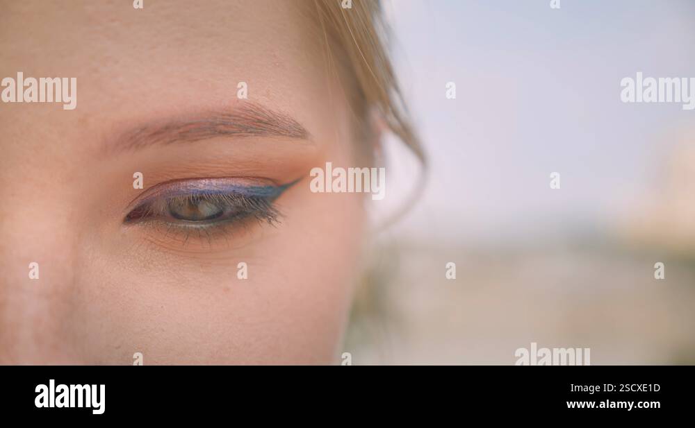 Closeup half face portrait of young pretty caucasian female face with ...