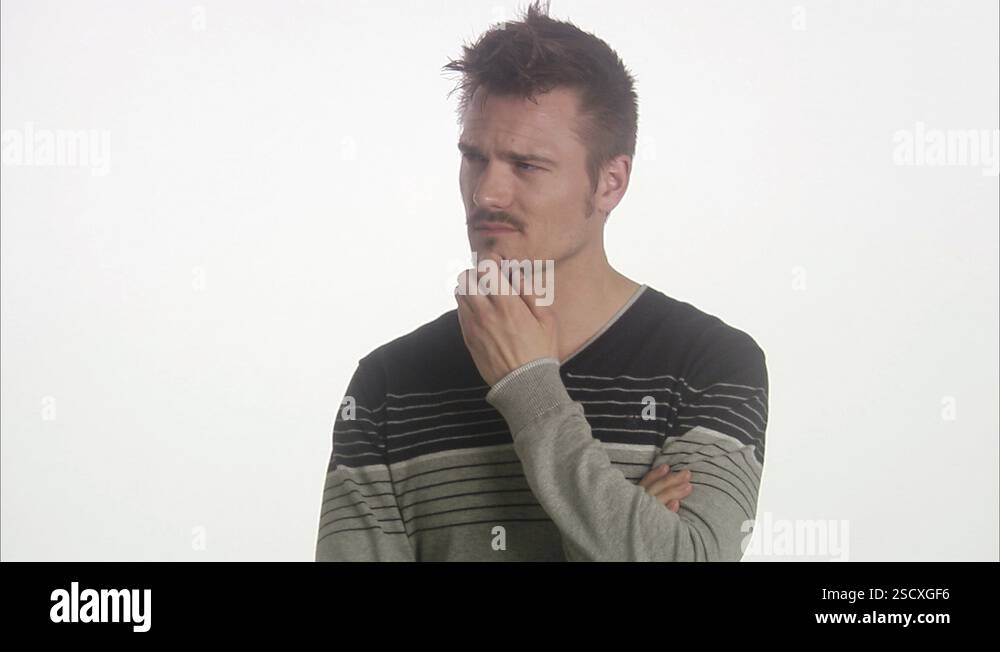 MS Man standing against white background Stock Video Footage - Alamy