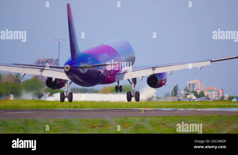 Aircraft landing at sunset. Airplane landing. Back view Stock Video ...
