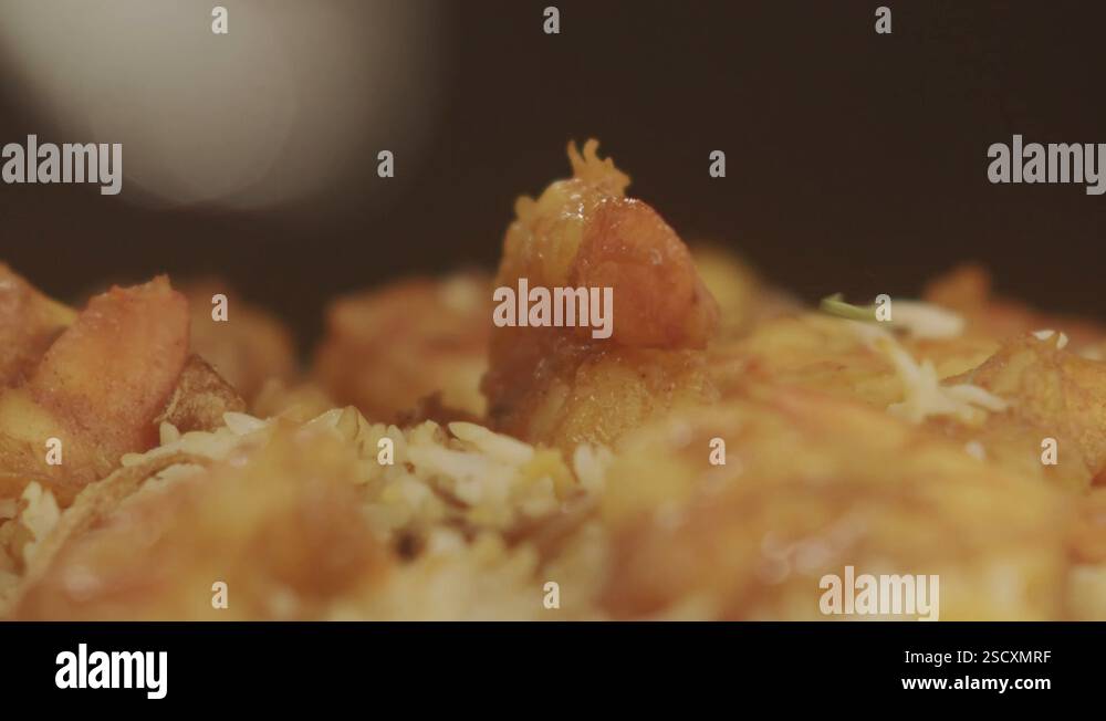 Close-up of plate of rice with shrimp spinning in slow motion Stock ...