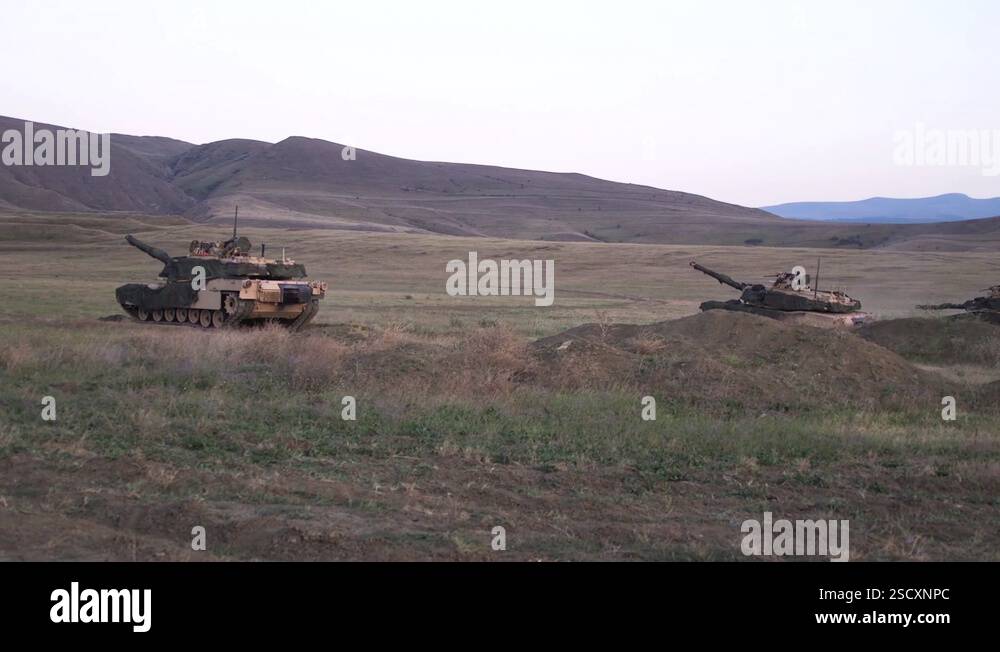 Three M1 Abrams tanks reverse into berms at range in Georgia during ...