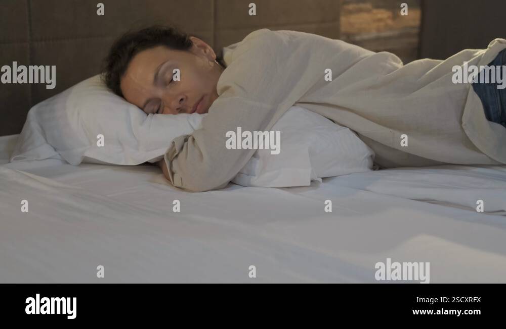 Woman hugging pillow sleeping Stock Videos & Footage - HD and 4K Video ...