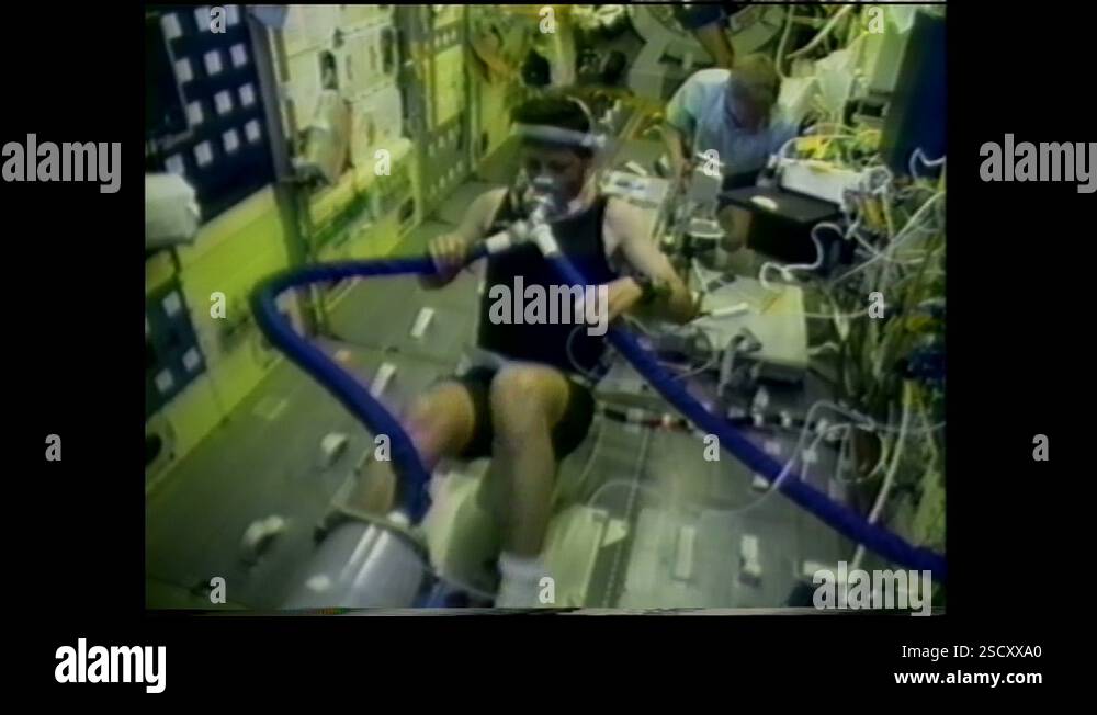 2000s: Astronauts row with oxygen masks and measurement gauges and ...