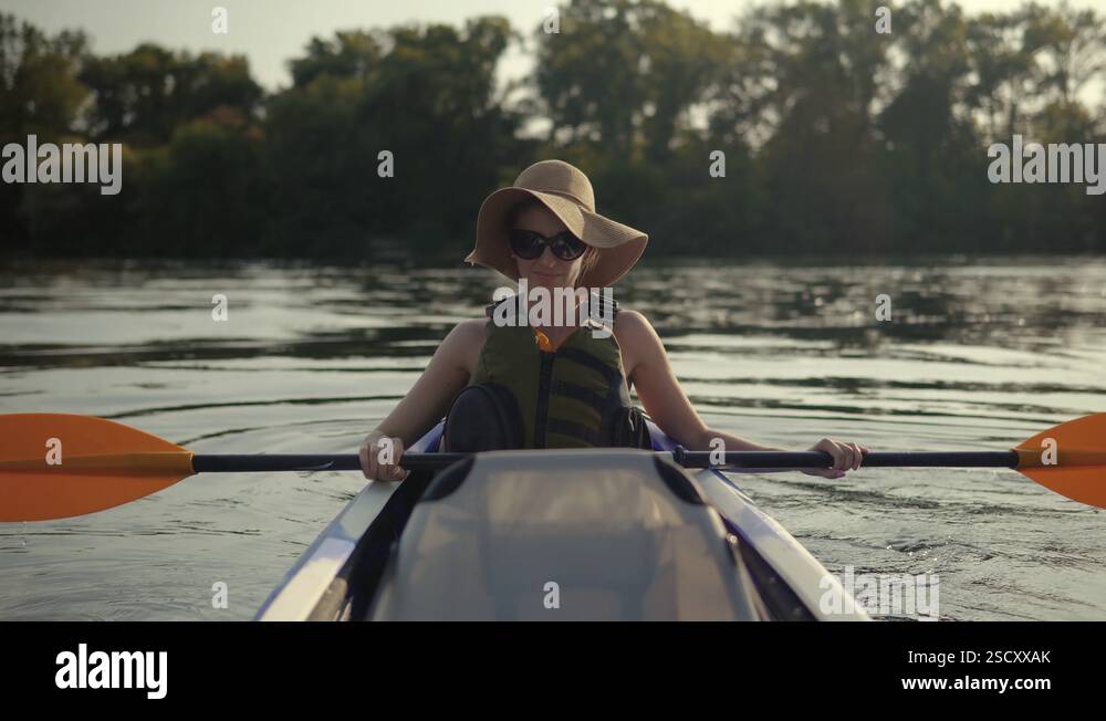 Close Up Girl In Kayak In Calm Water.Female With Canoe And Paddle Stock ...
