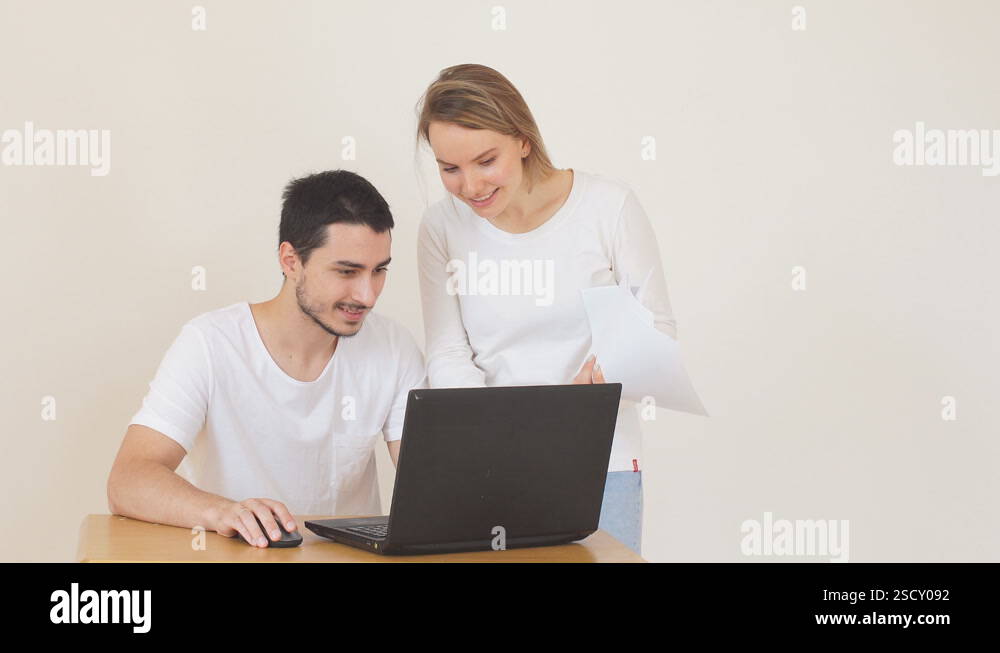Quiet couple with bills and laptop at home paying taxes Stock Video ...