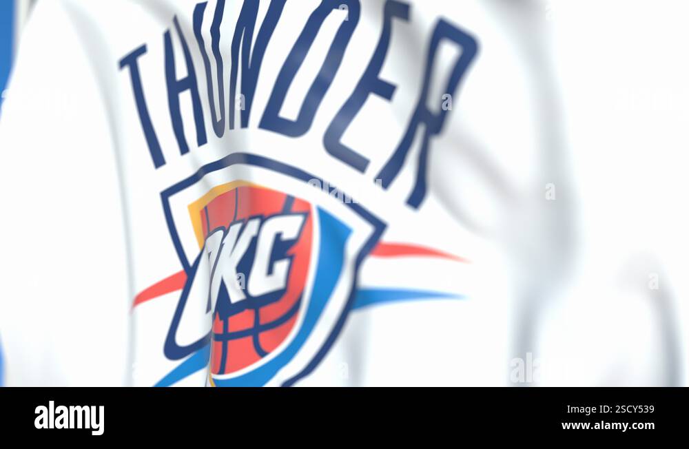 Waving flag with Oklahoma City Thunder team logo, close-up. Editorial ...