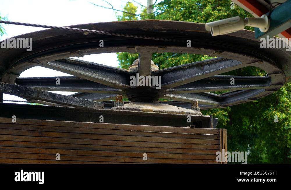 old cable way mechanism with rusty details working in city park in ...