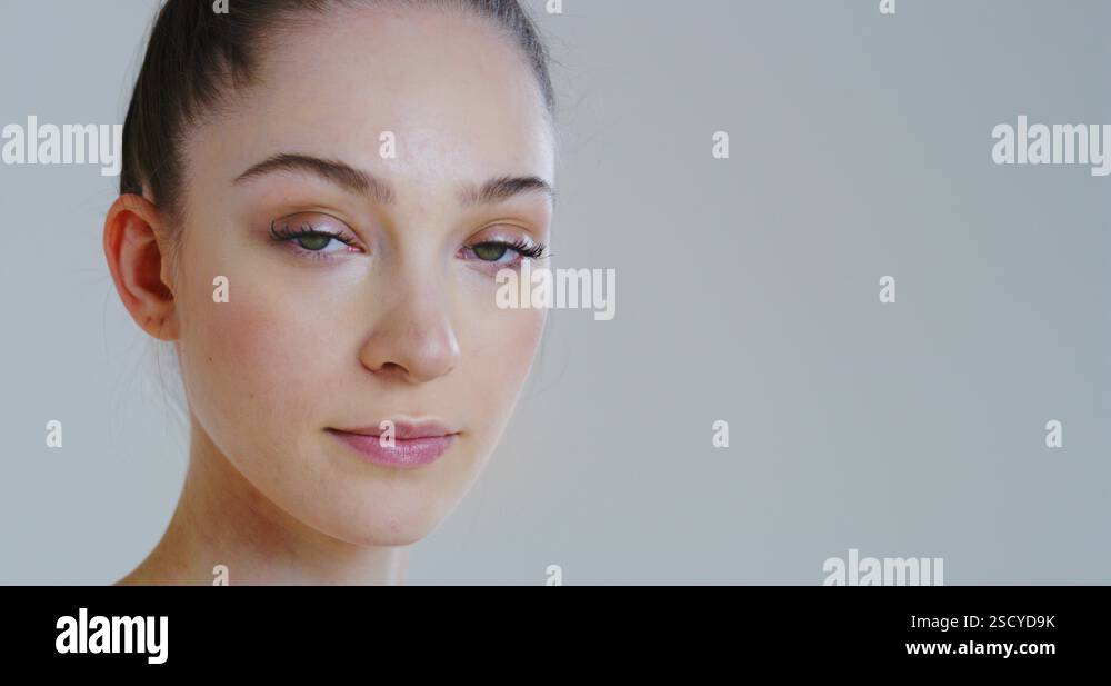 Slow motion of african woman with perfect skin is touching it gently ...