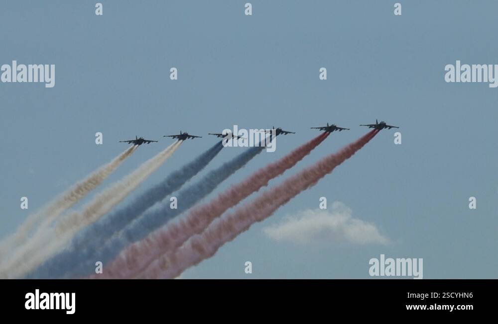 Behind Six Su-25 attack aircraft (Frog) are smoke in color of Russian ...