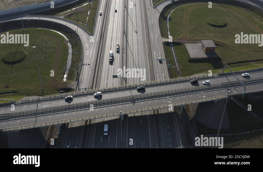 Motor transport moves on a high-speed ring road Stock Video Footage - Alamy