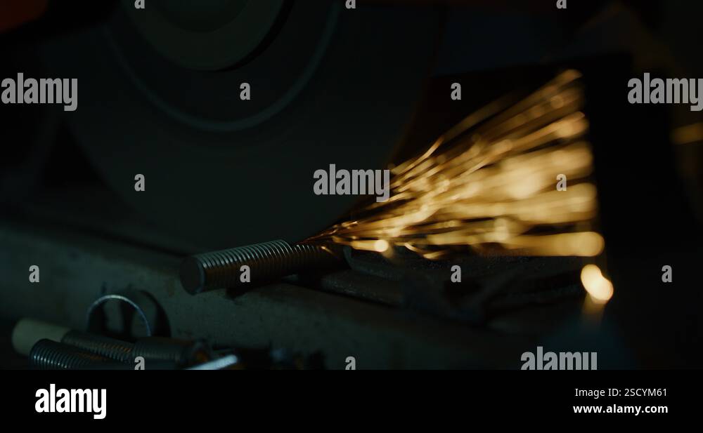 Industrial worker grinding metal with a lot of sharp sparks Stock Video ...
