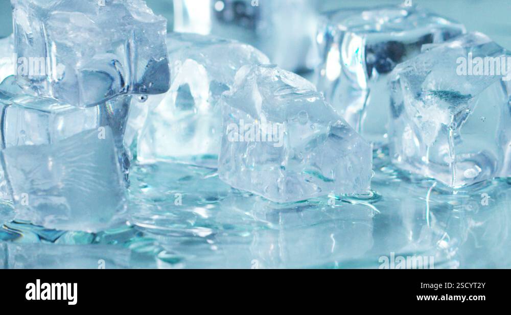 Macro shot of pure water ice cubes are melt on white background Stock ...