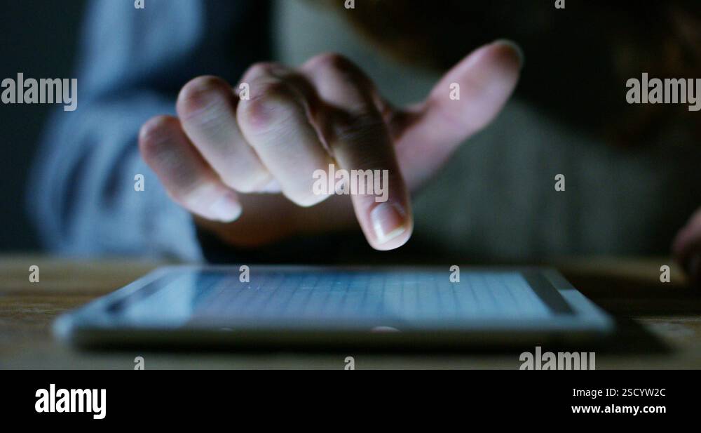 Macro shot of hand is typing on a LCD touch screen and using ...