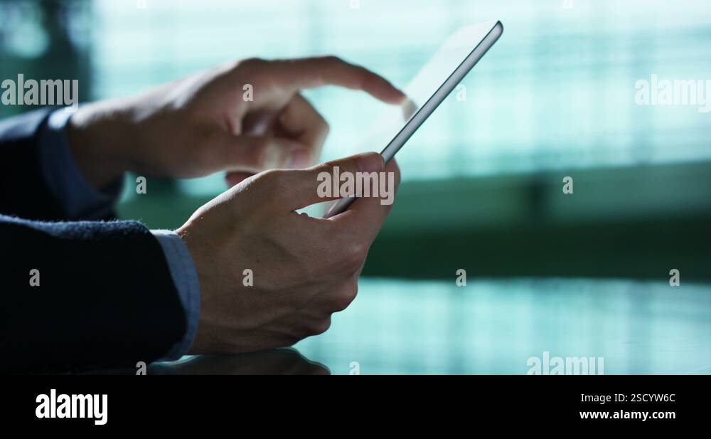 Macro shot of hand is typing on a LCD touch screen and using ...