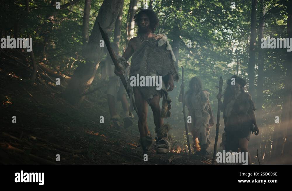 Tribe of Hunter-Gatherers Wearing Animal Skin Holding Stone Tipped ...