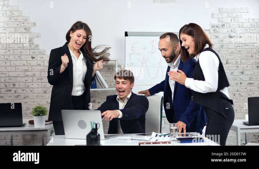 Happy business people celebrating successful deal dancing clapping hand ...