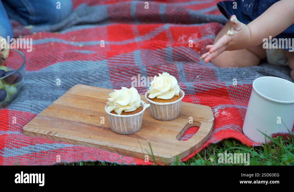 Cute Baby Girl Smashing Cupcake with Hands Stock Video Footage - Alamy