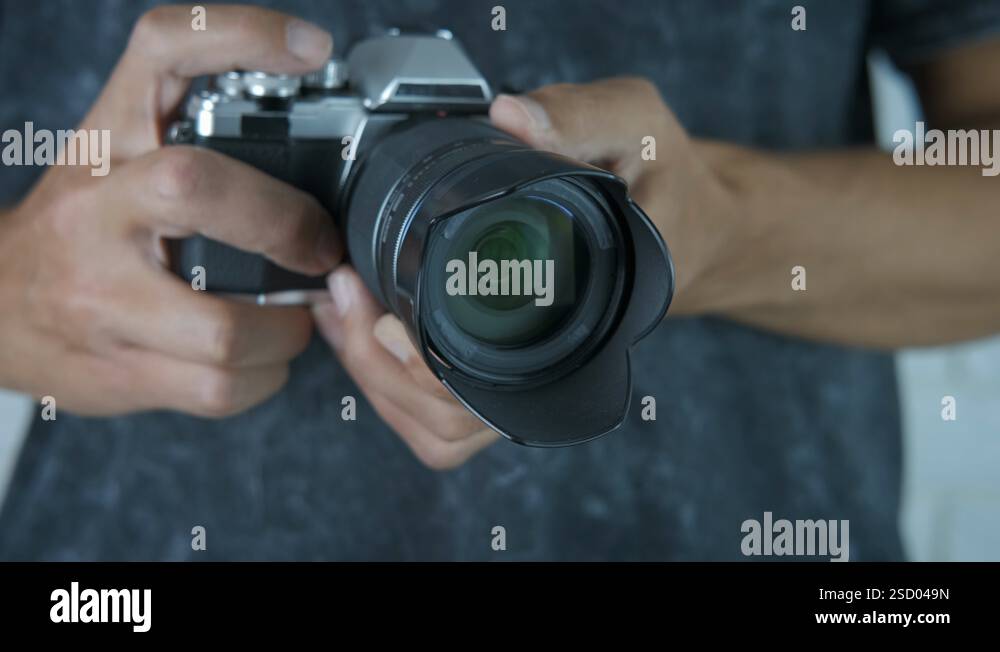 Man`s hand focus the camera Stock Video Footage - Alamy