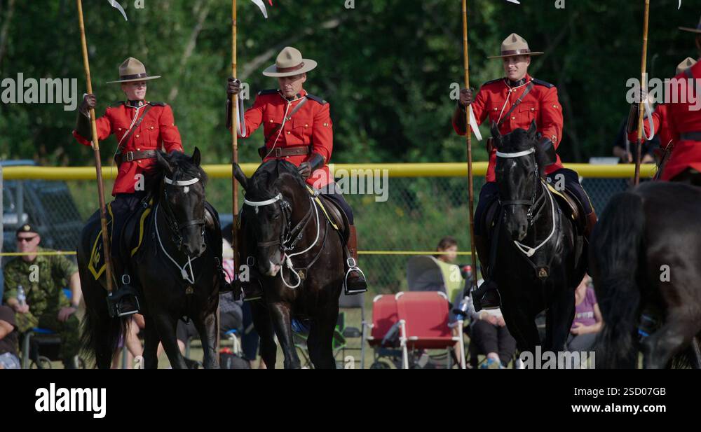 Group of Canadian Mounties in a row on horseback during a Musical Ride ...