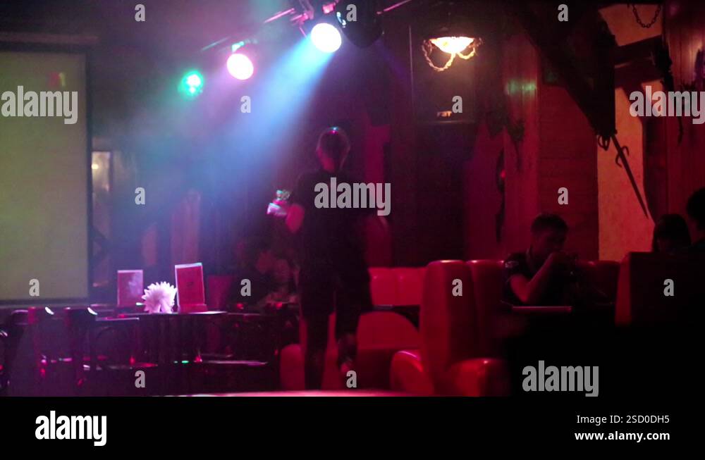 Waitress at a nightclub Stock Video Footage - Alamy