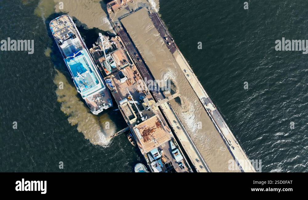 Boat and barge working with sand on extraction site. Extraction of sand ...