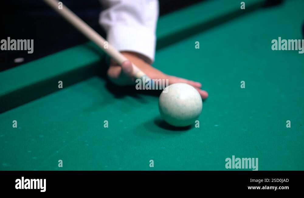 American pool, swimming pool for nine balls. The boy plays billiards ...