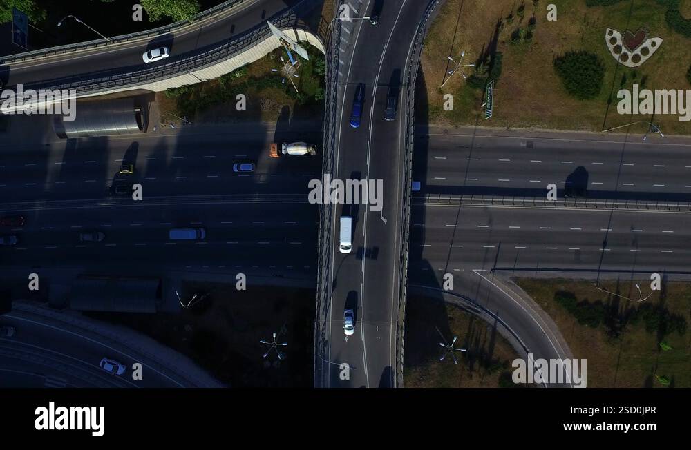 Cars moving on road junction in city. Top view car traffic highway ...