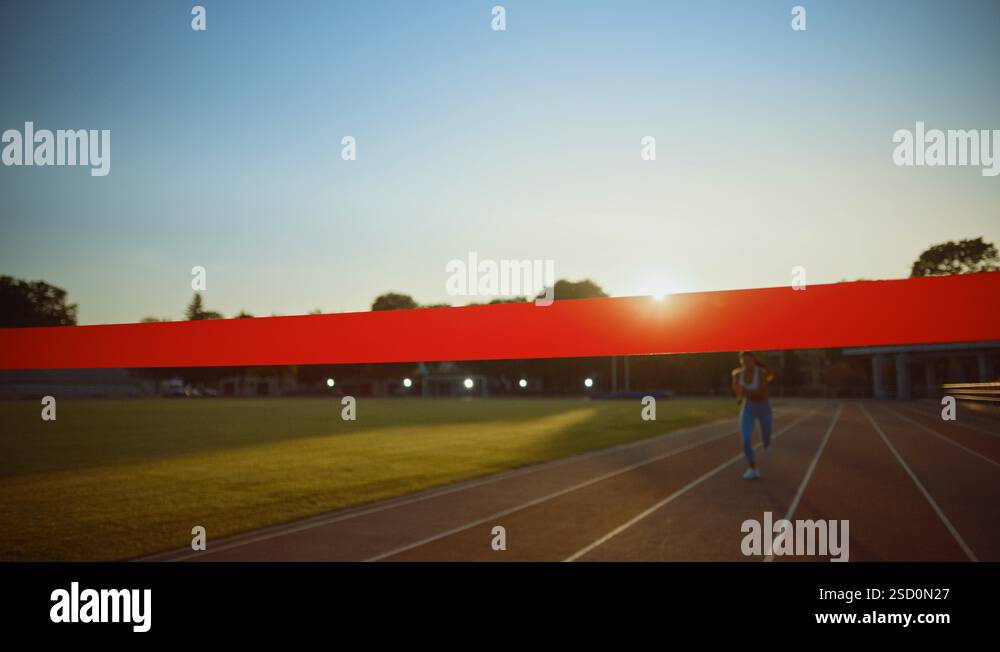 Beautiful Fit Female Runner Crossing Finish Line on Professional Sports ...