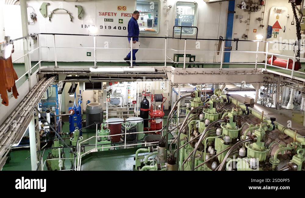 professional engineer walks on upper ground of engine room Stock Video ...