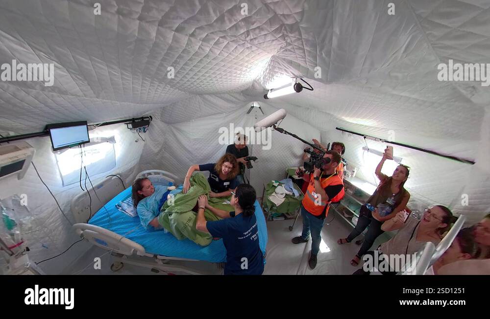 A woman giving birth in field hospital during National Earthquake Drill ...