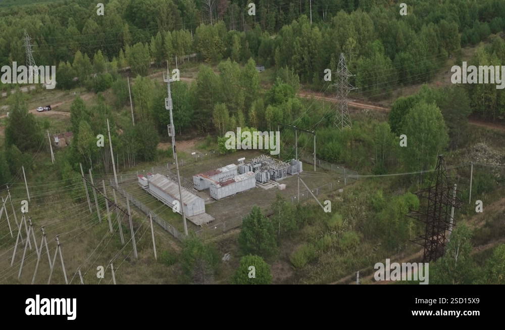 Air high-voltage switches. Electrical poles with wires and insulators ...