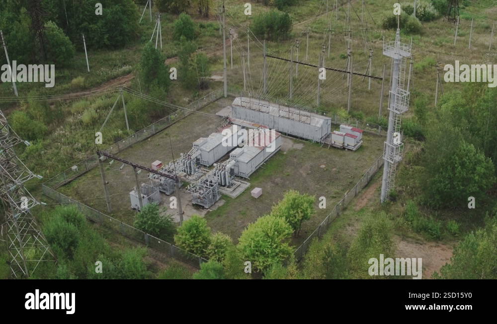 Air high-voltage switches. Electrical poles with wires and insulators ...
