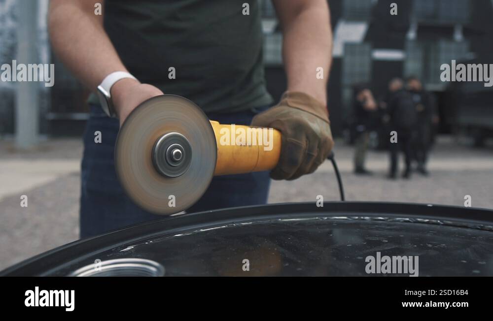 The Man Saws Angular Grinding Machine Iron Details Sparks From Angular ...