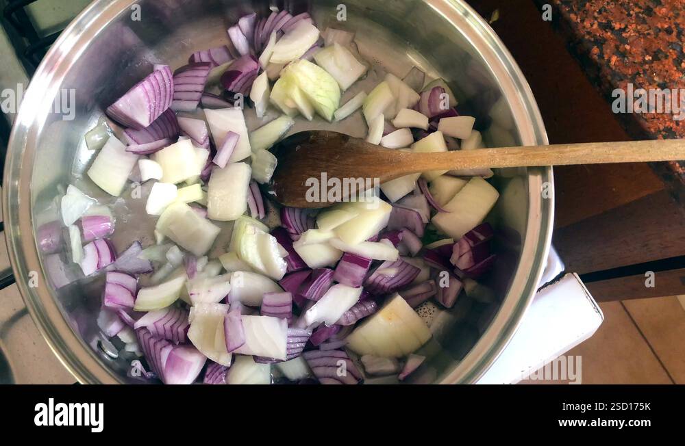 cooking onions, frying food Stock Video Footage - Alamy
