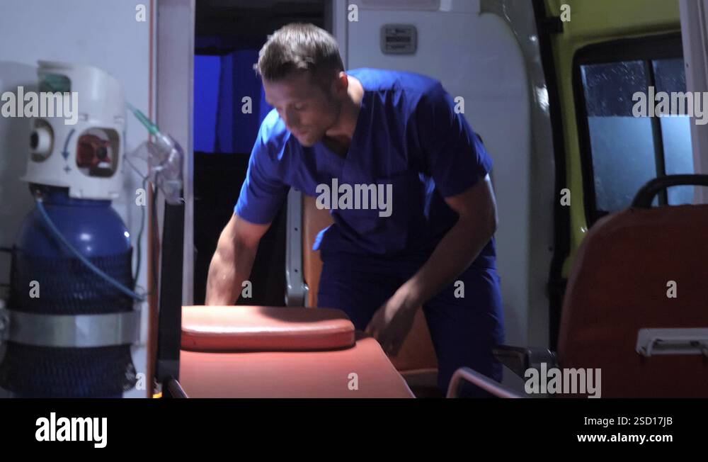 Corpsman in ambulance car pack equipment Stock Video Footage - Alamy