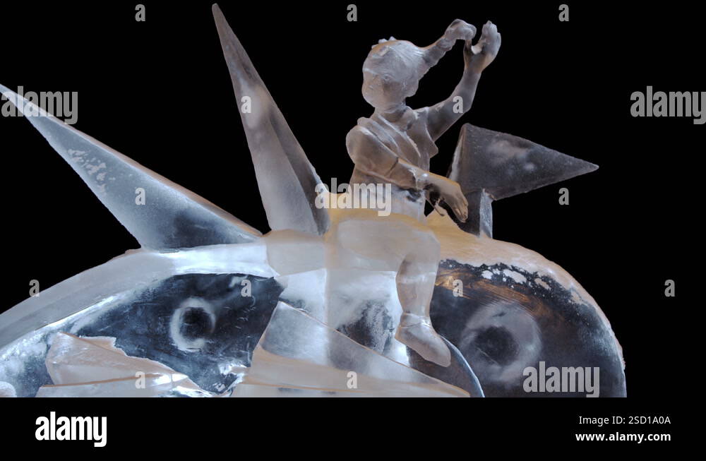 Ice sculpture of frozen girl riding on sea wave. Ice Sculptures in ...