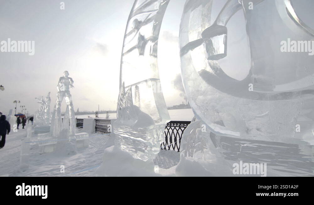 Ice sculpture of woman carries buckets of water. Moon concept. Ice ...