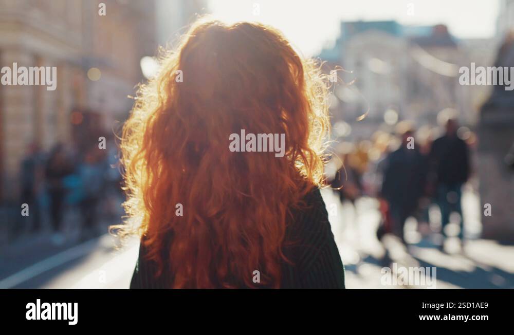 Amazing portrait of spectacular smiling redhead young woman walking ...