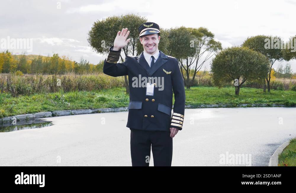 pilot welcomes waving commander airline aviator Stock Video Footage - Alamy