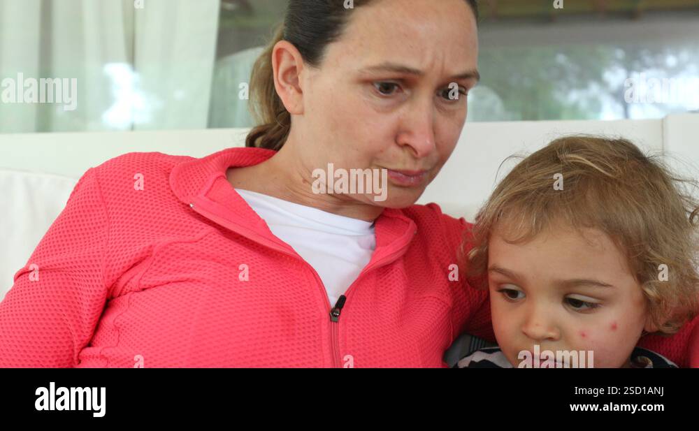 Mother reading story book to child Stock Video Footage - Alamy