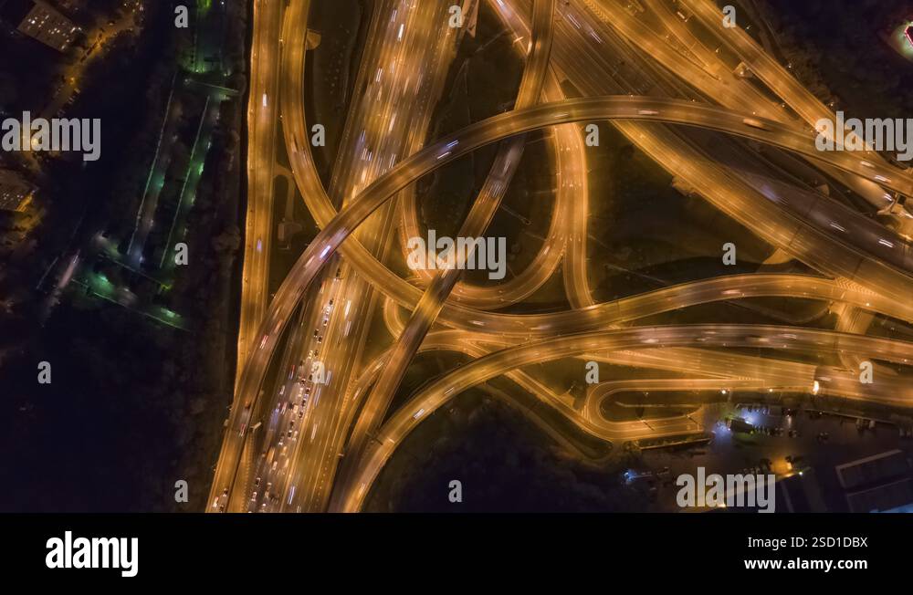 Road Junction and Cars Traffic at Night. Flyover. Aerial Top Down View ...