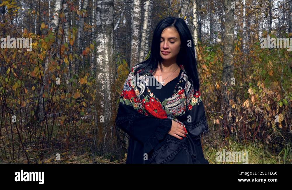 A girl with black hair looks like a gypsy, she's all alone in the ...