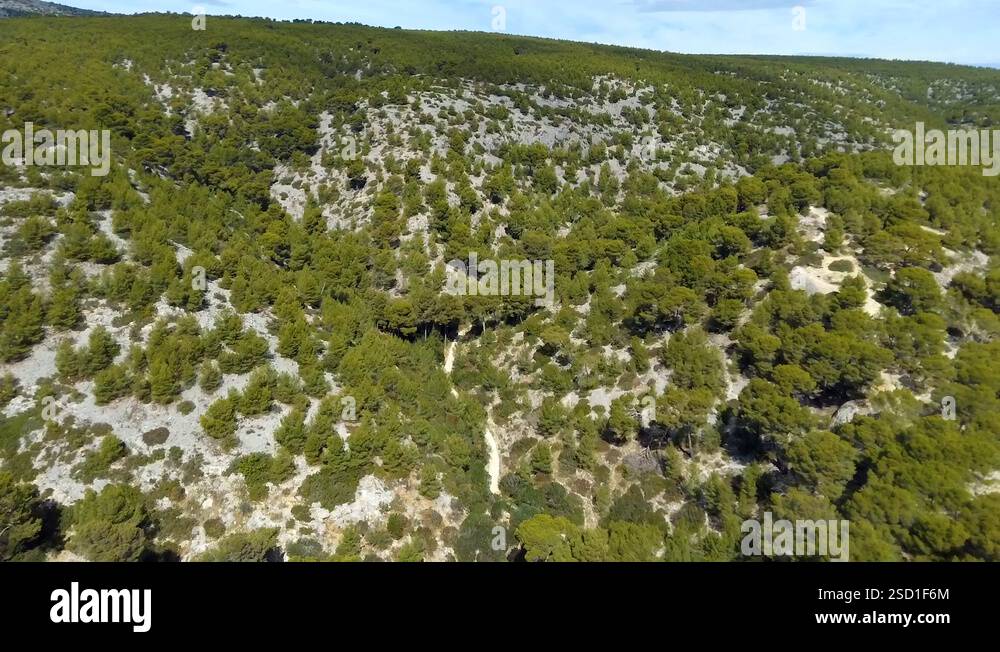 Aerial clip over the scenic beaches of Calanques de Port Pin, France ...